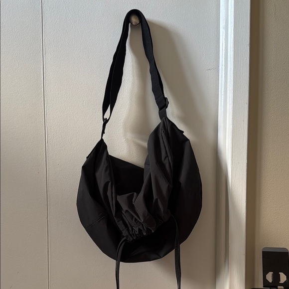 Uniqlo | Bags | Uniqlo Large Black Drawstring Crossbody Bag | Poshmark